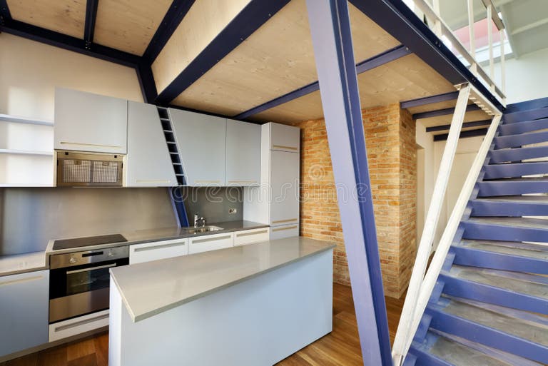 Kitchen under mezzanine stock photo. Image of apartment - 22129272