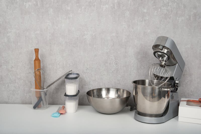 Kitchen Utensils Against the Background of Gray Wall. Mixer, Blender ...