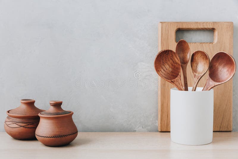 Kitchen Utensils Background. Wooden Spoons and Cutting Board on Light ...