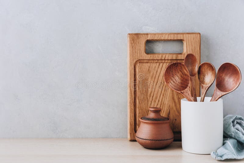 Kitchen Utensils Background. Wooden Spoons and Cutting Board on Light ...