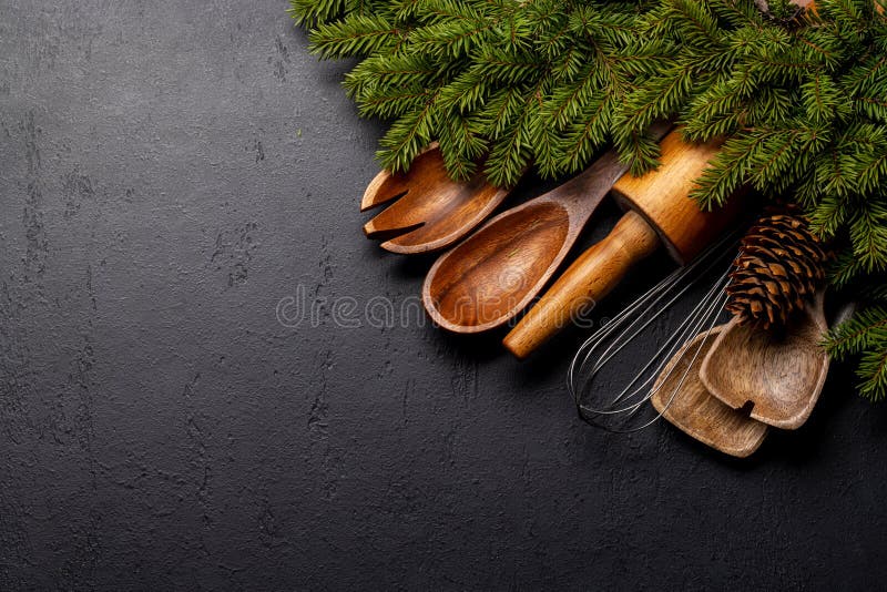 Kitchen Utensils and Fir Tree Branches on Cooking Table. Christmas ...