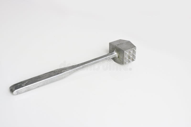 Kitchen Utensils - a Hammer for Beating Meat on a Pink Background ...