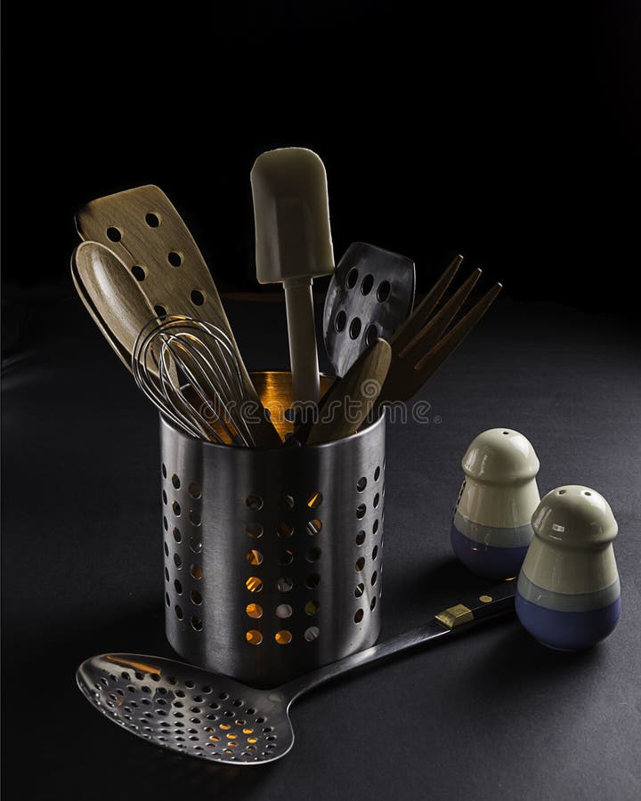 Kitchen Utensils in Metallic Container Stock Image - Image of pierced ...
