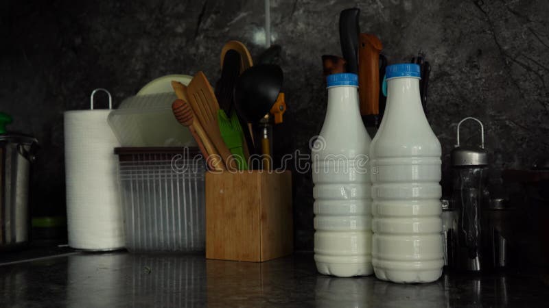 Kitchen Utensils and Milk Standing on the Kitchen Corner Stock Footage ...