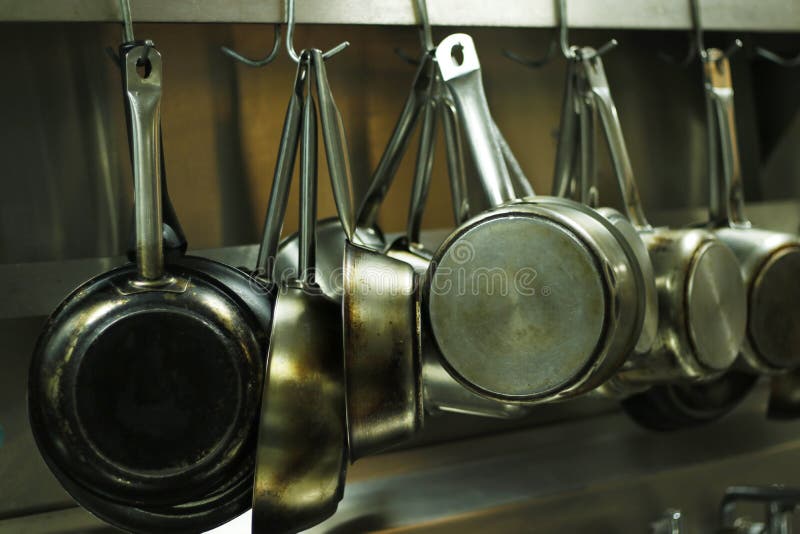 Kitchen Utensils, Pans and Pots Hanging with Hooks Stock Image - Image ...