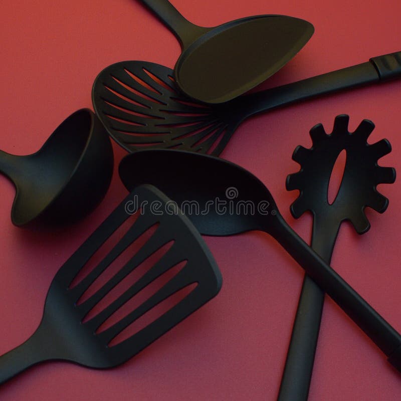 Kitchen Utensils on a Rough Red Surface Stock Image - Image of ovenware ...