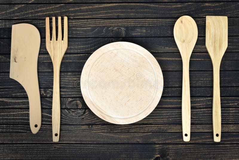 Kitchen utensils on table stock image. Image of cutlery - 76080019