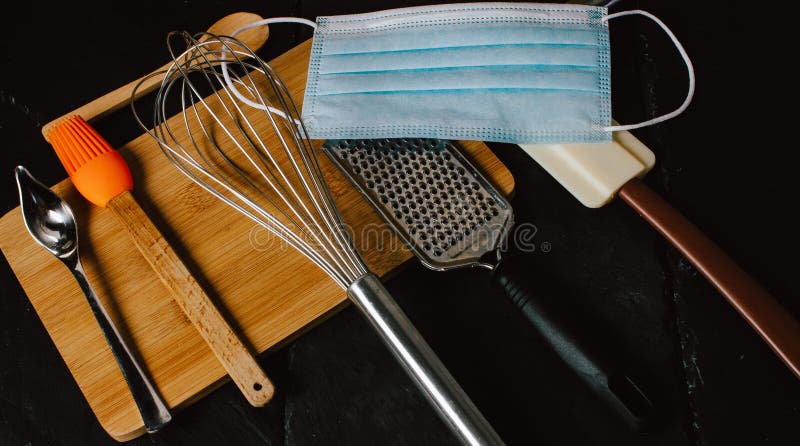 Kitchen Utensils and Tools. Face Mask in Modern Kitchen Stock Image ...