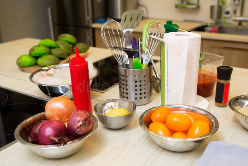 Kitchen Utensils and Vegetables on the Kitchen Table Stock Photo ...