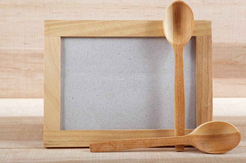Kitchen Utensils and Wooden Frame on a Wooden Board Stock Photo - Image ...