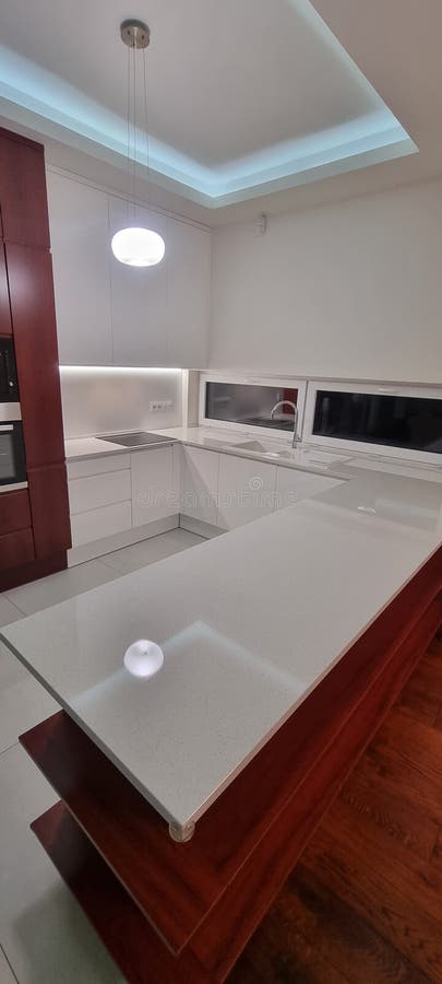 Kitchen, View of the Kitchen Counter, Sink and Induction Hob. Stock ...
