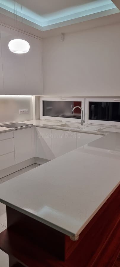Kitchen, View of the Kitchen Counter, Sink and Induction Hob. Stock ...