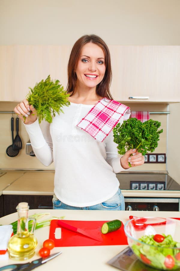 Kitchen woman making salad stock image. Image of happy - 38261145