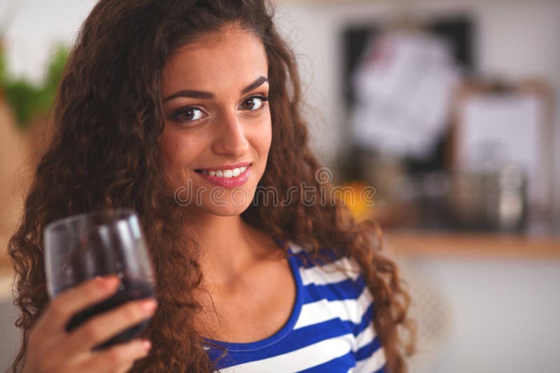Kitchen Woman. Pretty Woman Drinking Some Wine at Home Stock Image ...