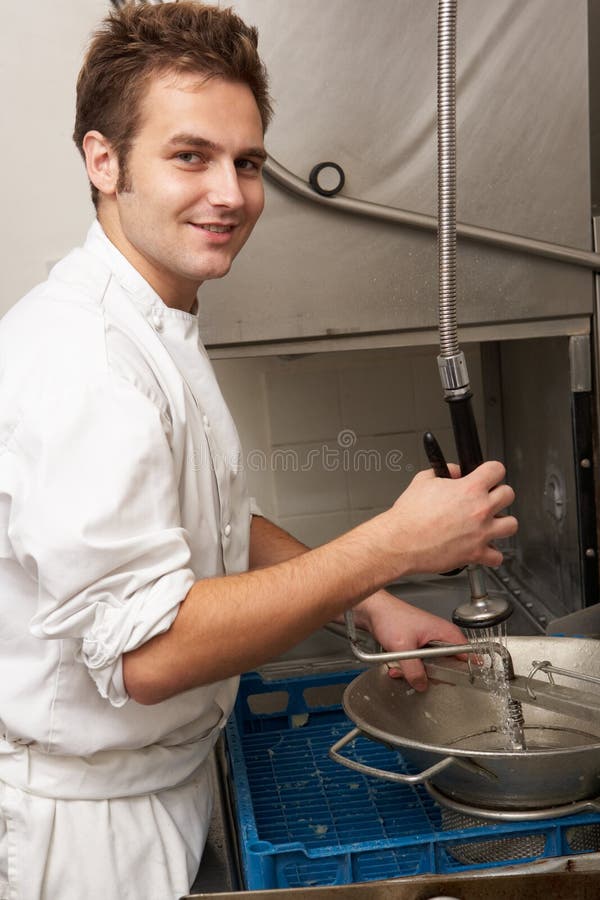 Kitchen Worker Washing Up in Restaurant Kitchen Stock Image - Image of ...