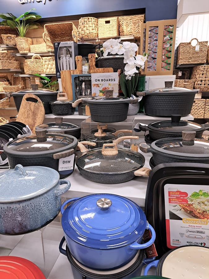 The Kitchenware Section of a Large Store. a Counter with Colorful Pots ...
