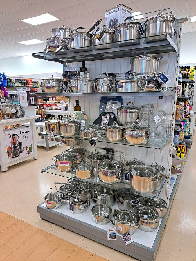 The Kitchenware Section of a Large Store. a Counter with Steel Pots ...