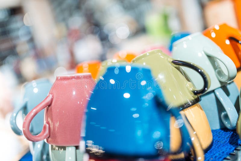 Empty Mugs of Different Shapes and Sizes on the Table Stock Photo ...