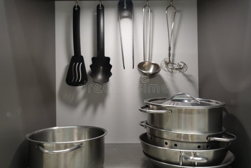 Kitchenware Show on a Display Shelf and Hang on the Wall Stock Image ...