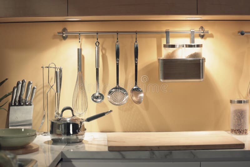 Kitchenwares Hanging on the Wall Stock Photo - Image of lifestyle ...