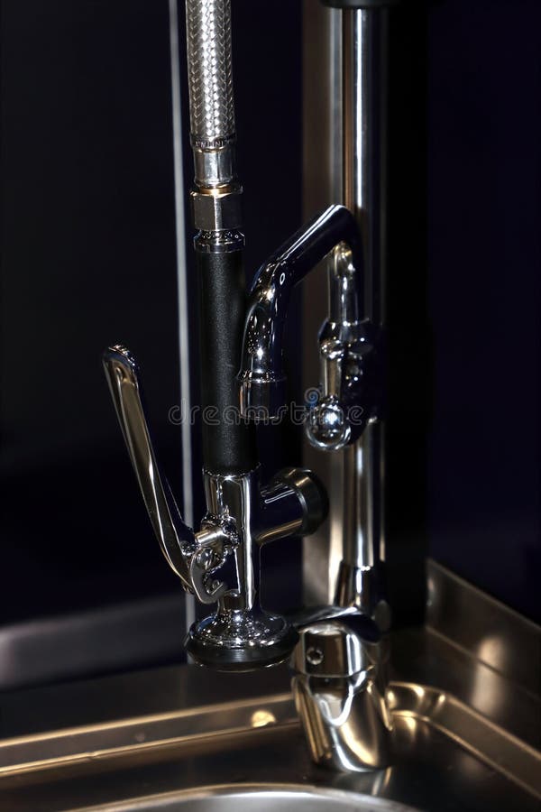 Kitcher Sink Faucet with Sprayer Stock Photo - Image of chrome, cabinet ...