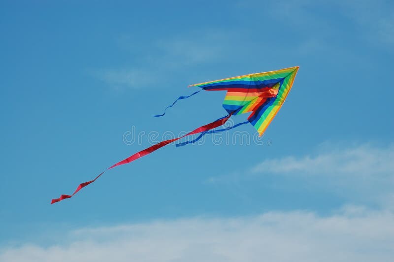 Kite stock photo. Image of ascend, blue, clouds, high, ribbon - 874736