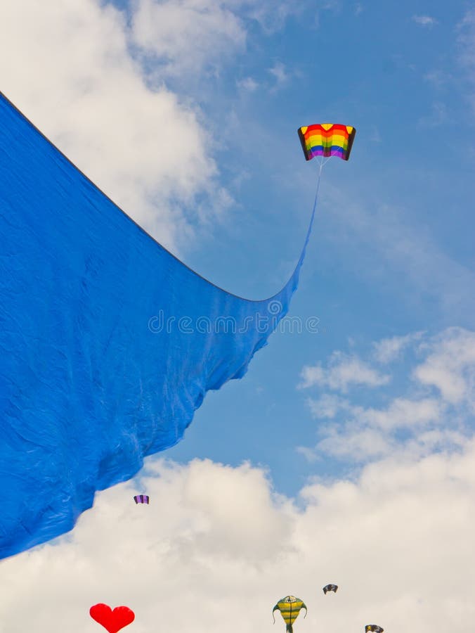 Kite with a Blue Ribbon Flying High Stock Photo - Image of colour ...