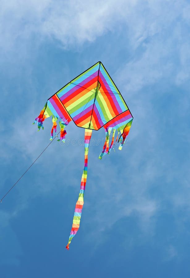 Kite with the Colors of the Rainbow Flies in the Sky Stock Photo ...