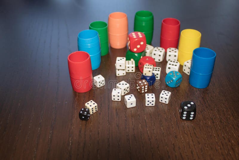Kite and Dice Stacked in Different Heights and Sizes Stock Image ...