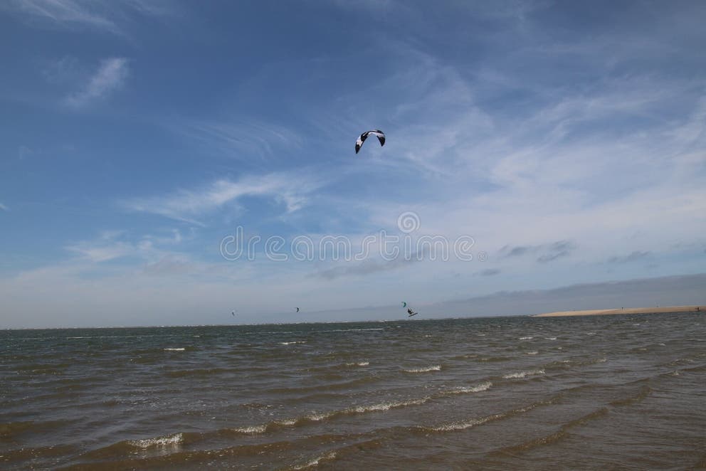 Kite Flying Above Water at a Beach Editorial Stock Image - Image of ...