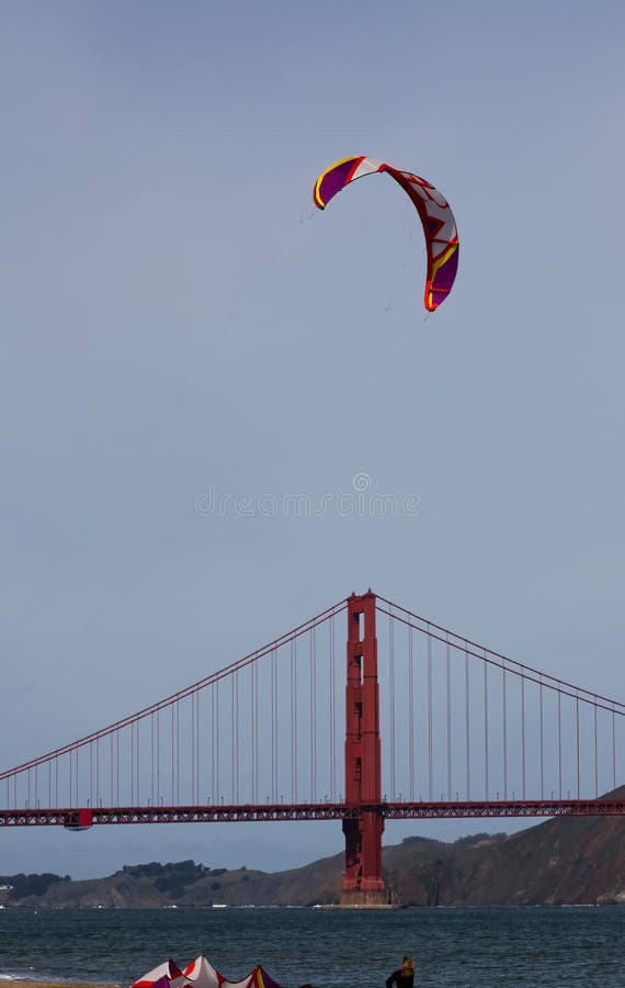 Kite Flying in Blue Sky with Golden Gate Bridge Background Stock Image ...