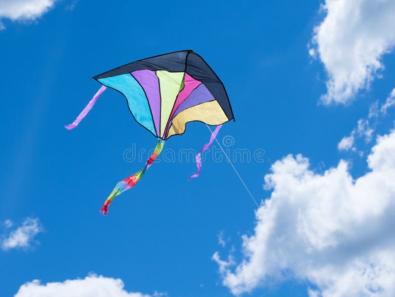 Kite Flying in the Sky among the Clouds Stock Image - Image of blue ...