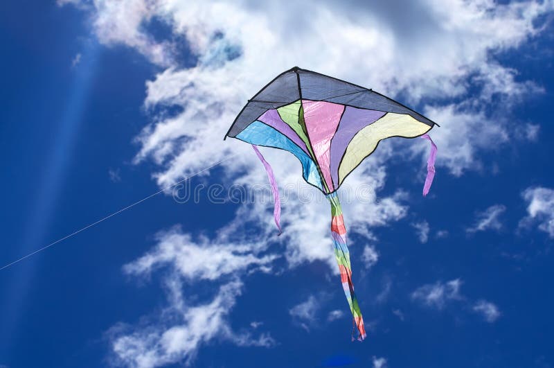Kite Flying in the Sky among the Clouds Stock Photo - Image of airborne ...