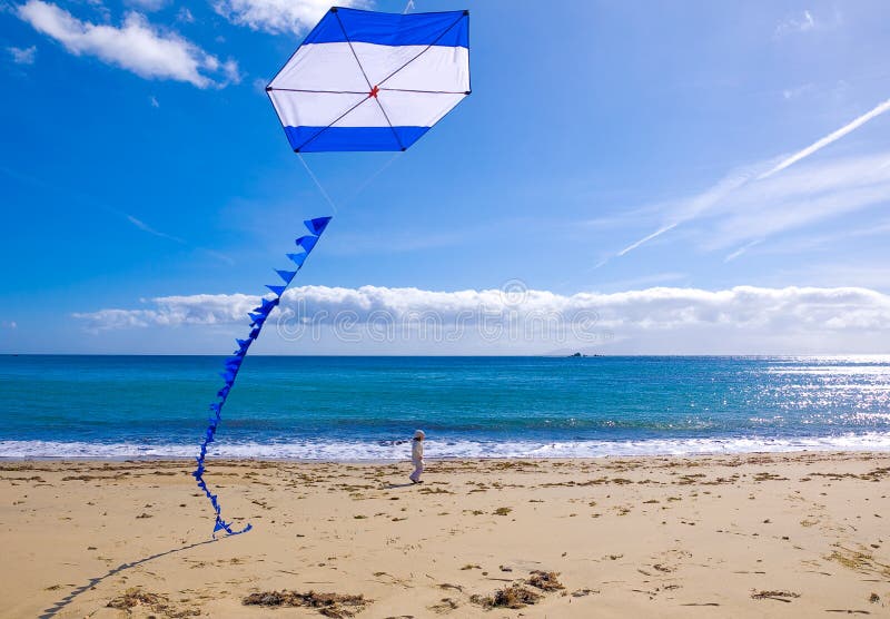 Kite Flying in Sky with Clouds Near the Sea Stock Photo - Image of ...
