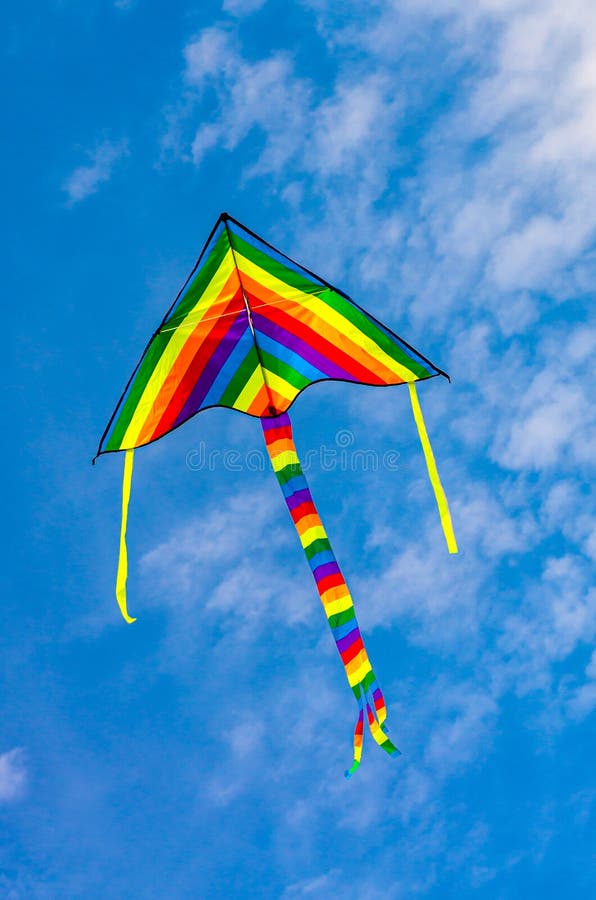 Kite soaring in the sky stock photo. Image of triangle - 270786664