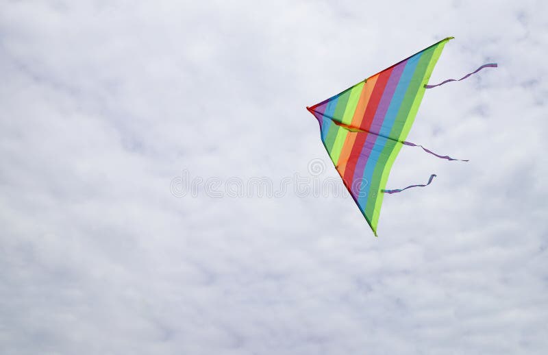 Kite Striped Colors of the Rainbow in the Sky. Stock Photo - Image of ...