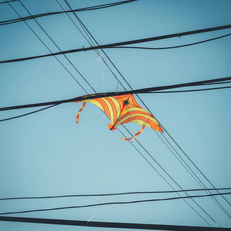 A Kite Stuck in Electrical Wires. Stock Photo - Image of stuck ...