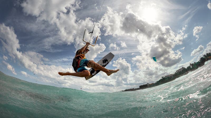 Kite Surfer Jumps with Kiteboard Stock Photo - Image of athletic ...