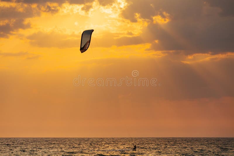 Kite Surfer Sailing in the Sea Stock Photo - Image of board, kiteboard ...