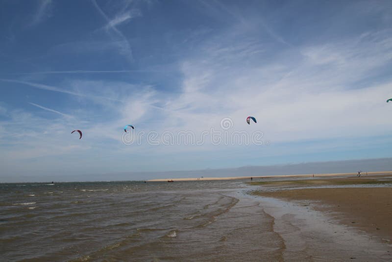Kites Flying Above Water at a Beach Editorial Photo - Image of kite ...