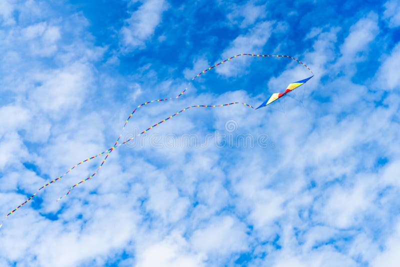 Kites Flying in the Sky among the Clouds.Kite Festival Editorial Stock ...