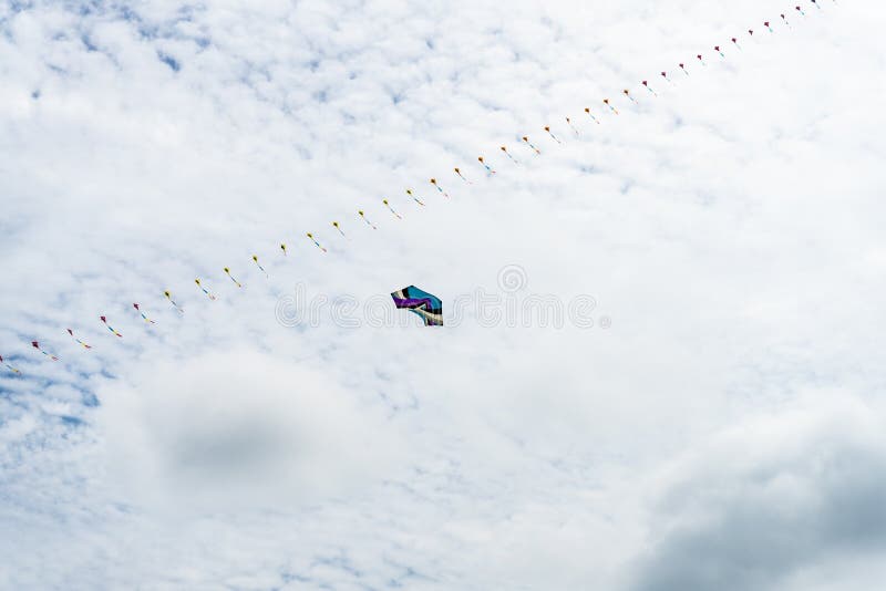 Kites Flying in the Sky among the Clouds.Kite Festival Stock Photo ...