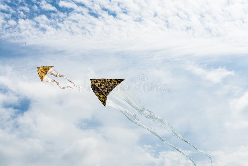 Kites Flying in the Sky among the Clouds.Kite Festival Stock Image ...