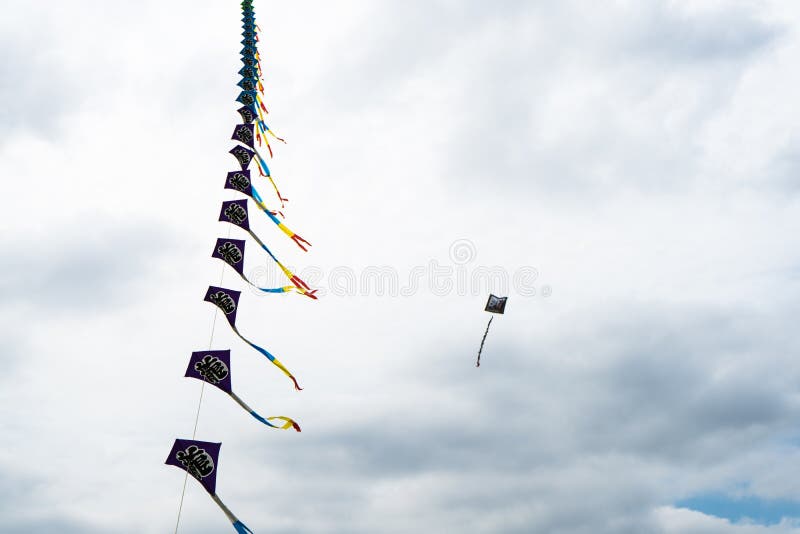 Kites Flying in the Sky among the Clouds.Kite Festival Stock Image ...