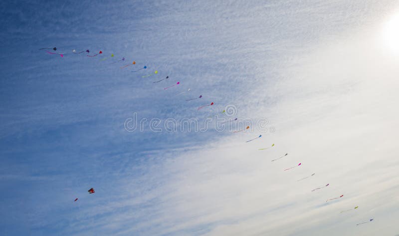 Kites Flying in the Wind in a Blue Sky in Sunlight at Fall Stock Photo ...