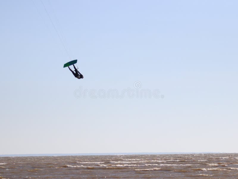 Kitesurfer jumping stock photo. Image of sports, wave - 259967862