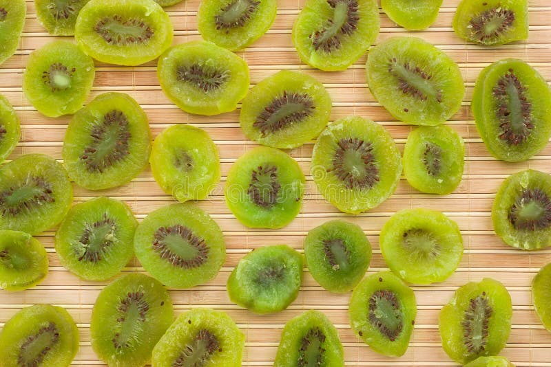 Kiwi on the bamboo mat stock image. Image of macro, date - 30732943