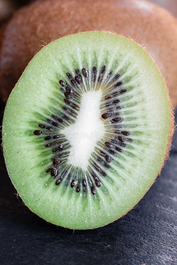 Kiwi Fruit Cut in Half stock image. Image of green, showing - 110707999
