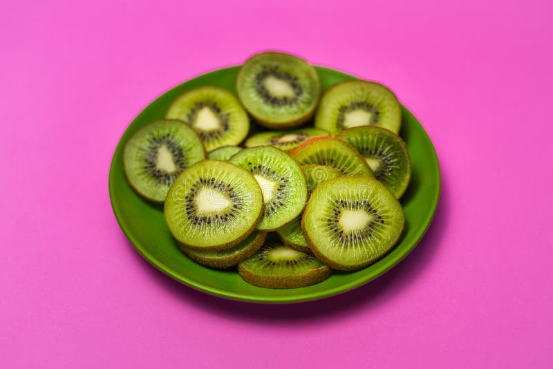 Kiwi Fruit in the Pink Background Stock Photo - Image of ripe, slice ...