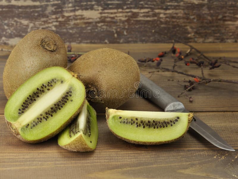 Kiwi Fruits Growing in a Tree Stock Image - Image of exotic, gourmet ...